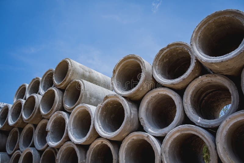 A Stack of Concrete Ring Pipes Piled and Creating a Symmetrical ...