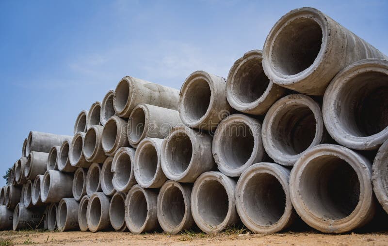 A Stack of Concrete Ring Pipes Piled and Creating a Symmetrical ...