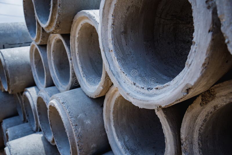A Stack of Concrete Ring Pipes Piled and Creating a Symmetrical ...