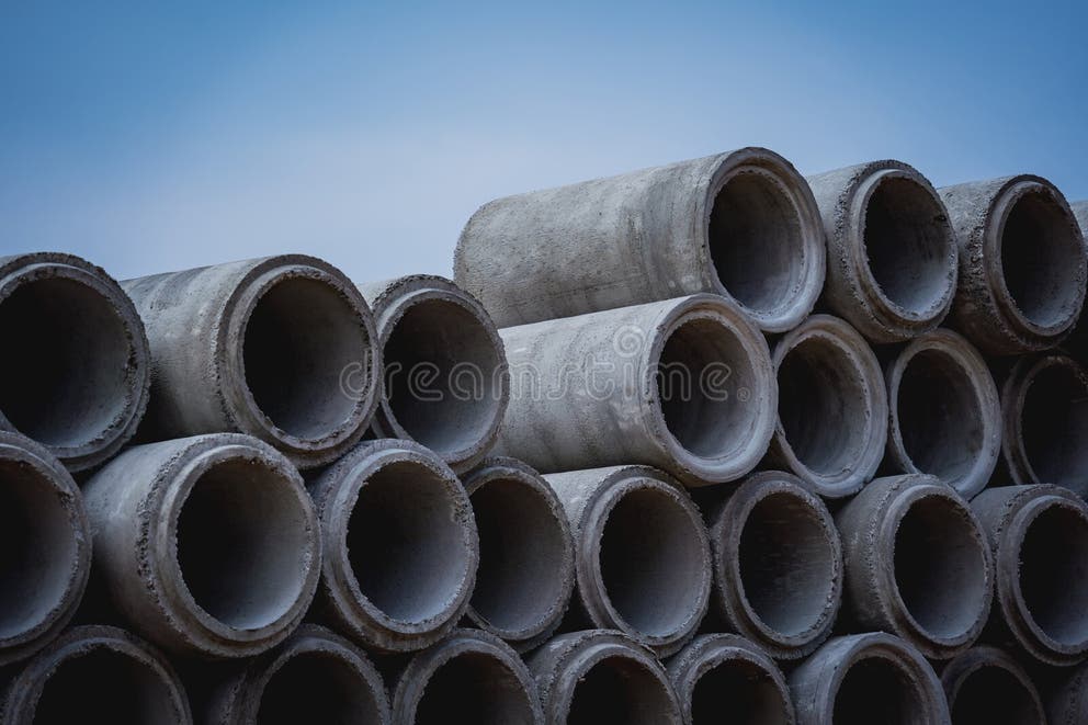 A Stack of Concrete Ring Pipes Piled and Creating a Symmetrical ...