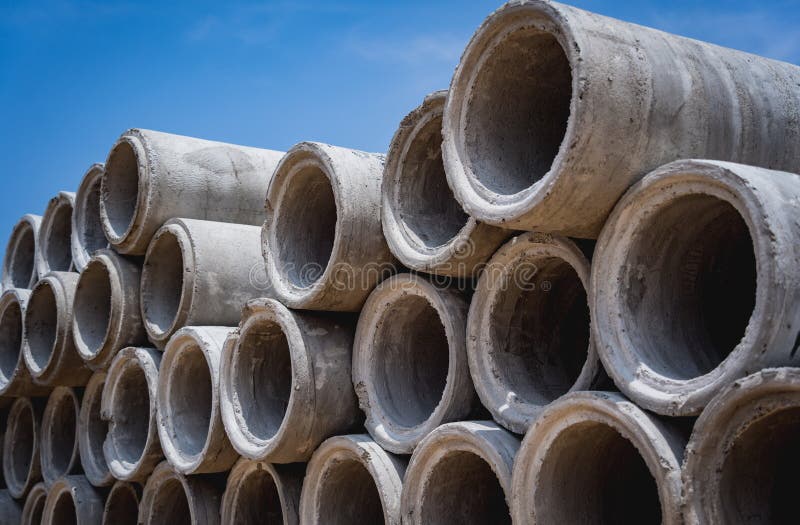 A Stack of Concrete Ring Pipes Piled and Creating a Symmetrical ...