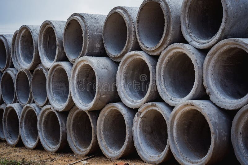 A Stack of Concrete Ring Pipes Piled and Creating a Symmetrical ...