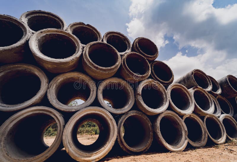 A Stack of Concrete Ring Pipes Piled and Creating a Symmetrical ...