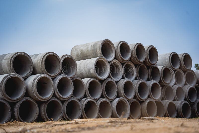 A Stack of Concrete Ring Pipes Piled and Creating a Symmetrical ...