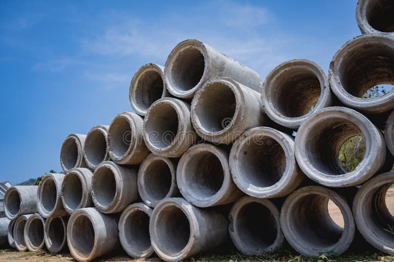 A Stack of Concrete Ring Pipes Piled and Creating a Symmetrical ...