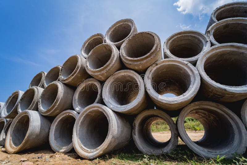 A Stack of Concrete Ring Pipes Piled and Creating a Symmetrical ...