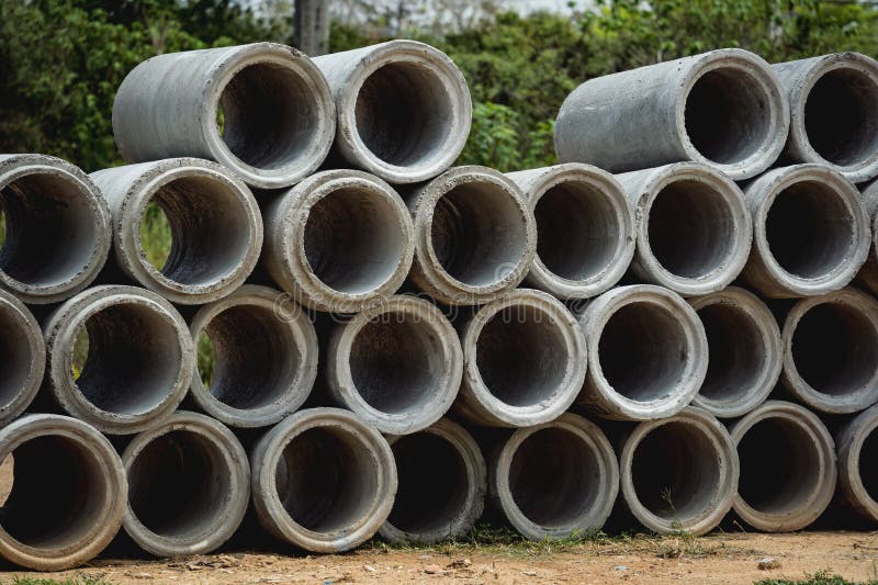 A Stack of Concrete Ring Pipes Piled and Creating a Symmetrical ...