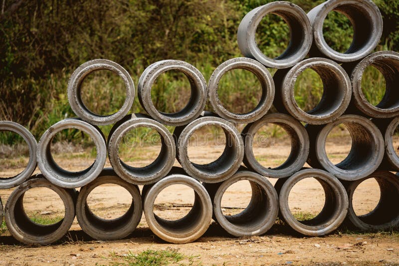 A Stack of Concrete Ring Pipes Piled and Creating a Symmetrical ...