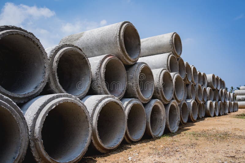 A Stack of Concrete Ring Pipes Piled and Creating a Symmetrical ...