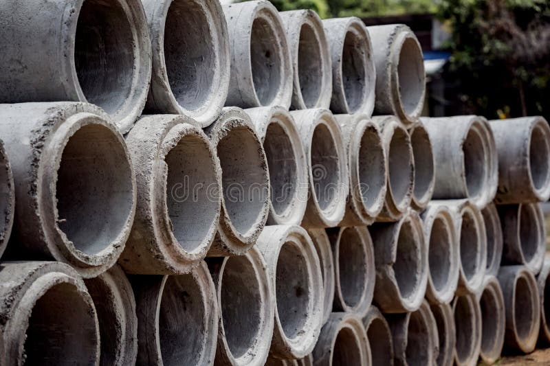 A Stack of Concrete Ring Pipes Piled and Creating a Symmetrical ...