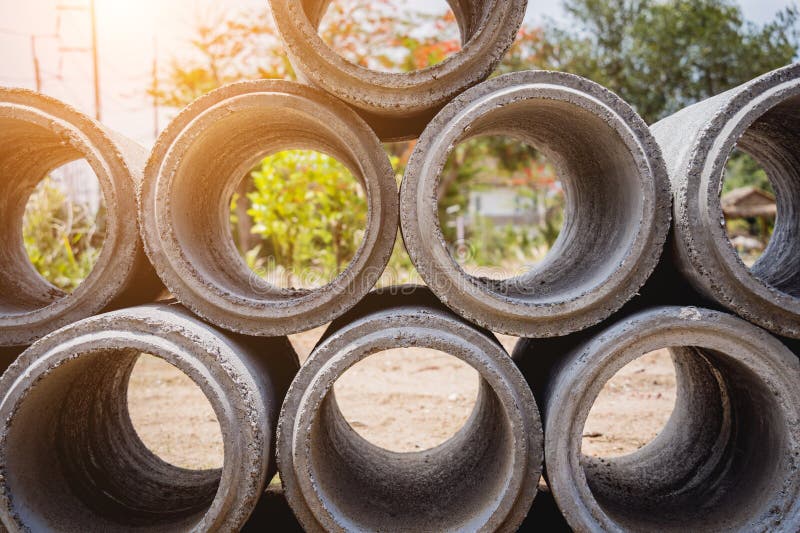 A Stack of Concrete Ring Pipes Piled and Creating a Symmetrical ...