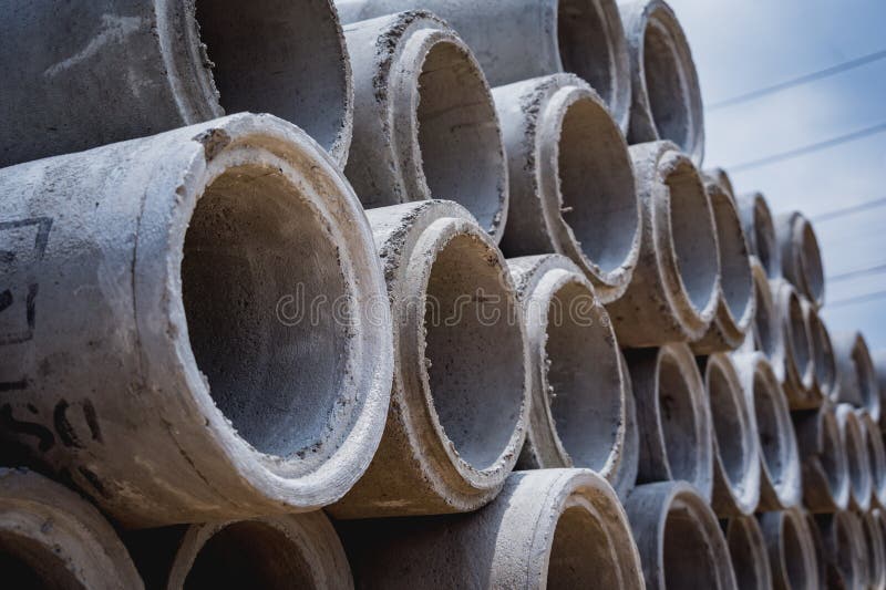 A Stack of Concrete Ring Pipes Piled and Creating a Symmetrical ...