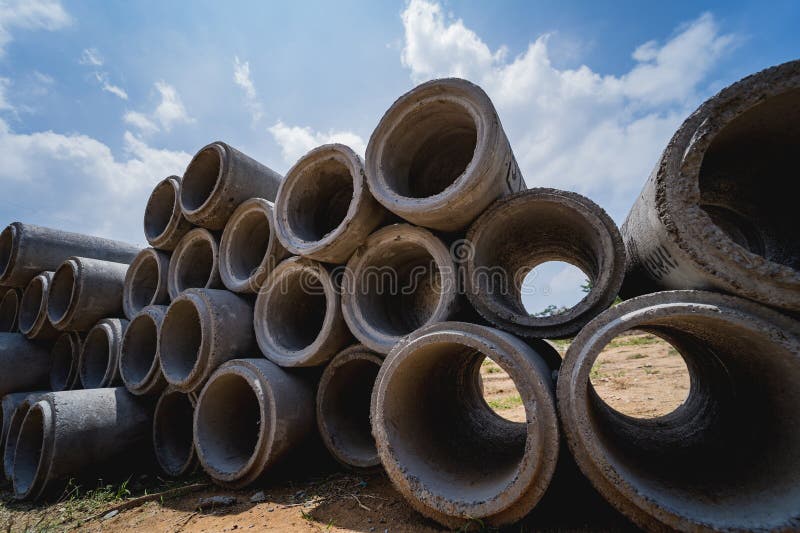 A Stack of Concrete Ring Pipes Piled and Creating a Symmetrical ...
