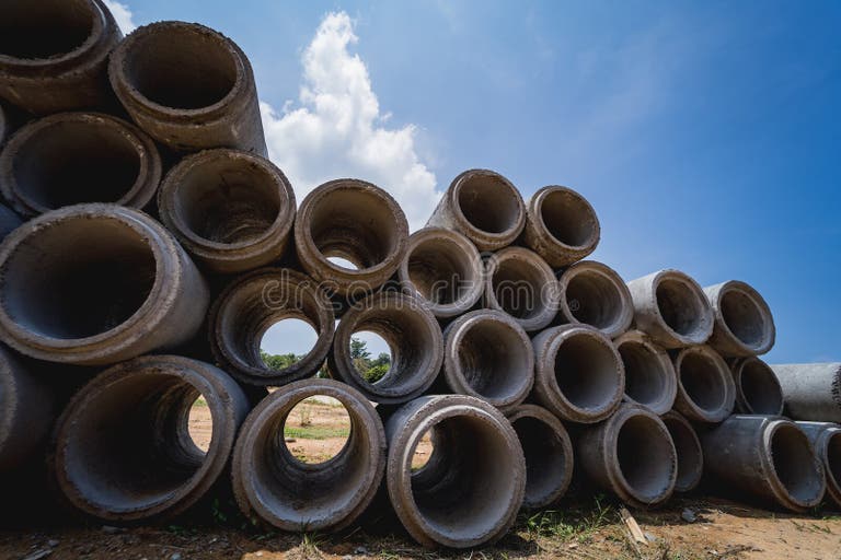 A Stack of Concrete Ring Pipes Piled and Creating a Symmetrical ...