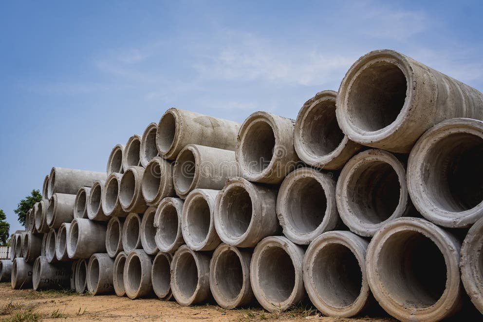 A Stack of Concrete Ring Pipes Piled and Creating a Symmetrical ...