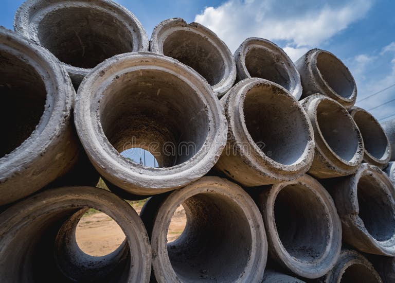 A Stack of Concrete Ring Pipes Piled and Creating a Symmetrical ...