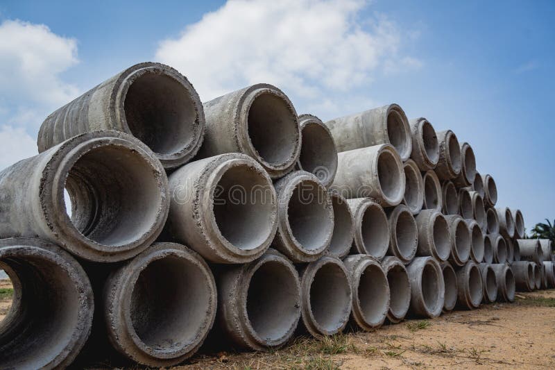 A Stack of Concrete Ring Pipes Piled and Creating a Symmetrical ...