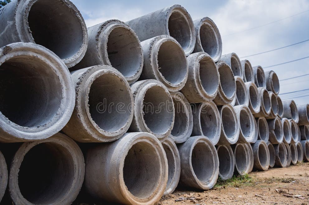 A Stack of Concrete Ring Pipes Piled and Creating a Symmetrical ...