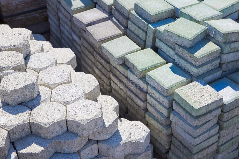 Stack of Concrete Self Locking Flooring Blocks on Wooden Pallet in a ...