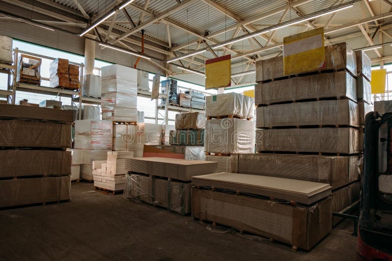 Stack of Construction Materials in the Warehouse Stock Photo - Image of ...