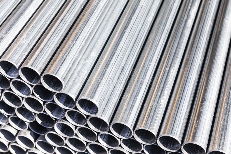 Stack of Construction Metal Pipes Stock Photo - Image of building ...