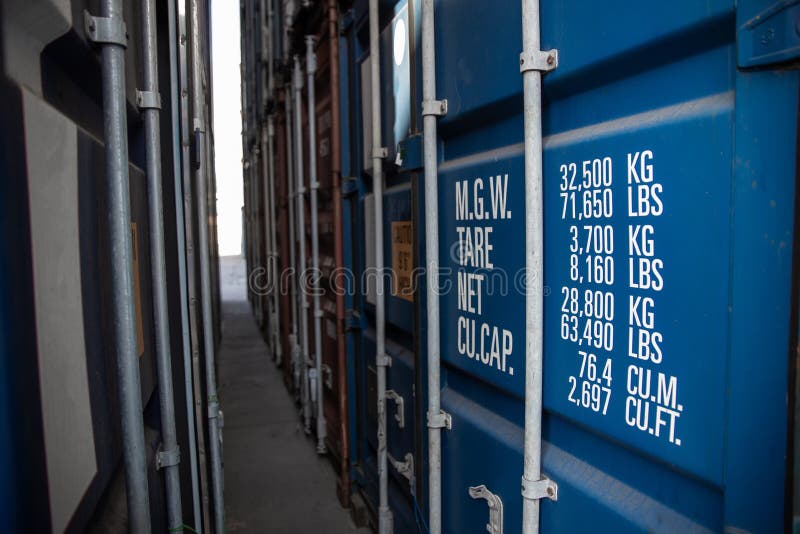 Stack of Containers in a Harbor. Shipping Containers Stacked on Cargo ...