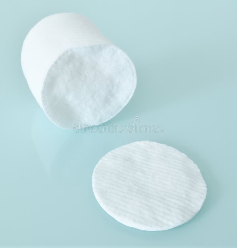 Stack of Cotton Disks on Light Blue Background Stock Photo - Image of ...