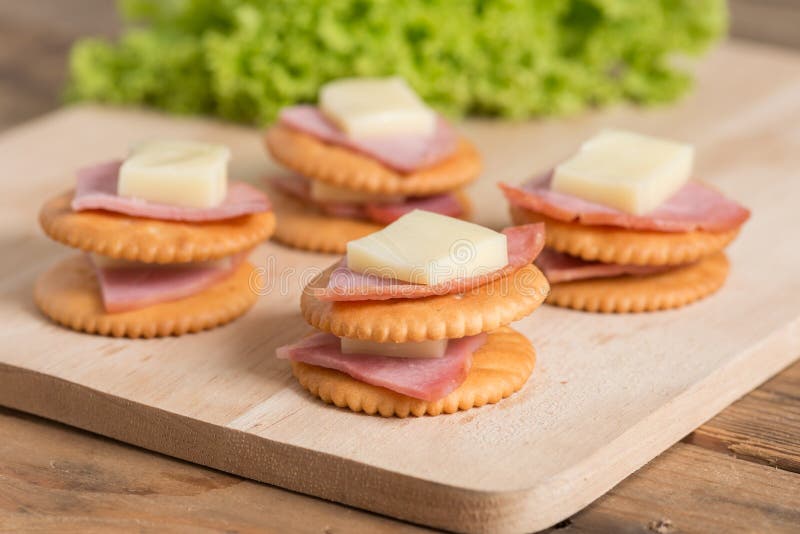 Stack of Crackers with Ham and Cheese. Stock Photo - Image of crispy ...