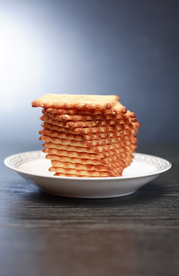Stack of Crackers stock photo. Image of cookie, saucer - 73214146