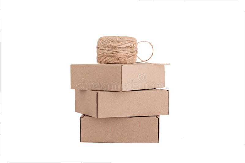 Stack of Craft Paper Boxes and Coil of Rope Isolated on White Stock ...