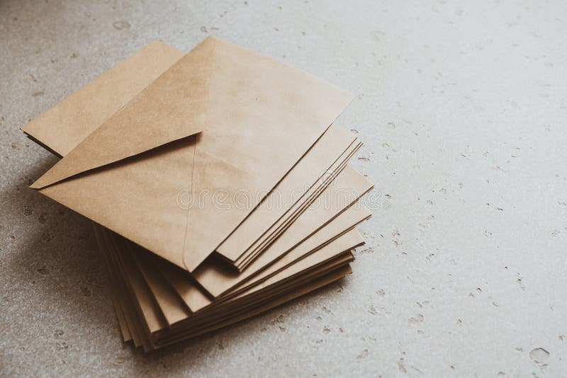 A Stack of Craft Paper Envelopes Stock Photo - Image of textile ...