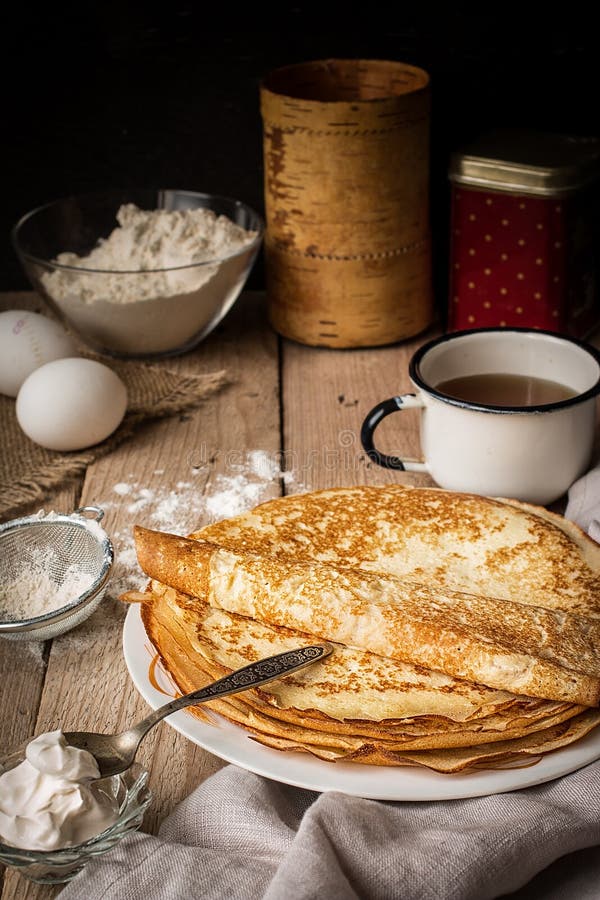 Stack of Crepes and Ingredients for Cooking on a Table Stock Image ...