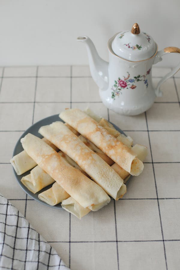Stack of Crepes on Kitchen Table. Pancakes for Breakfast, Food ...