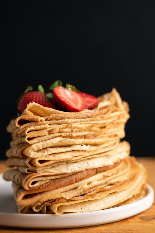 Stack of Crepes on Wooden Table, Black Background Stock Photo - Image ...
