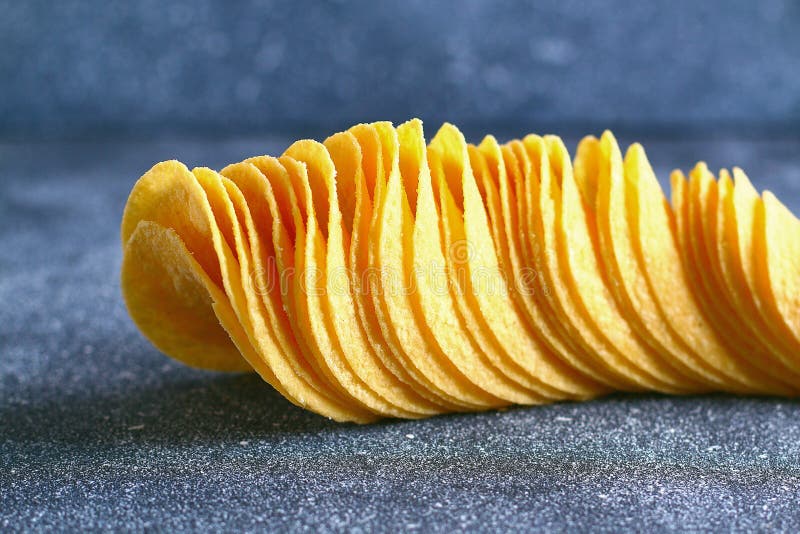 A Stack of Crispy Chips on a Gray Dark Table. Snack. Stock Image ...