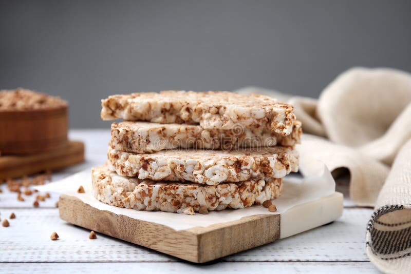 Stack of Crunchy Buckwheat Cakes on White Wooden Table Stock Photo ...