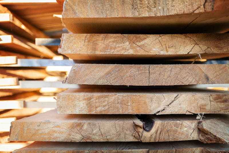 Stack of cut wooden boards stock image. Image of pile - 195558015