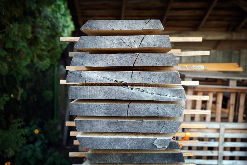 Stack of cut wooden boards stock photo. Image of plank - 195557740
