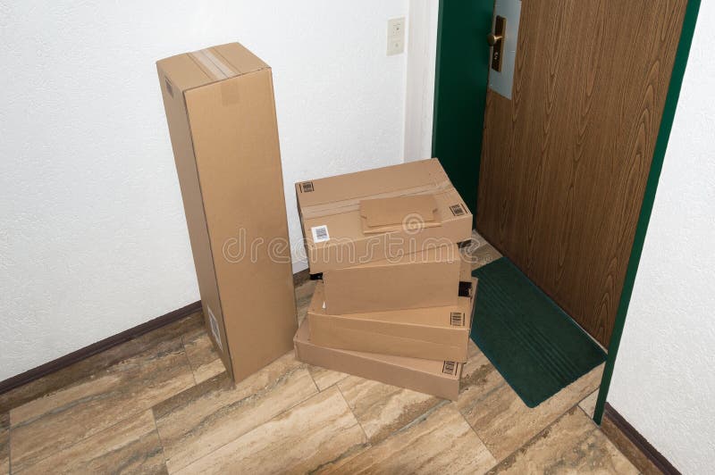 Stack of Delivered Packages in Front of a Door. Delivery Concept Stock ...