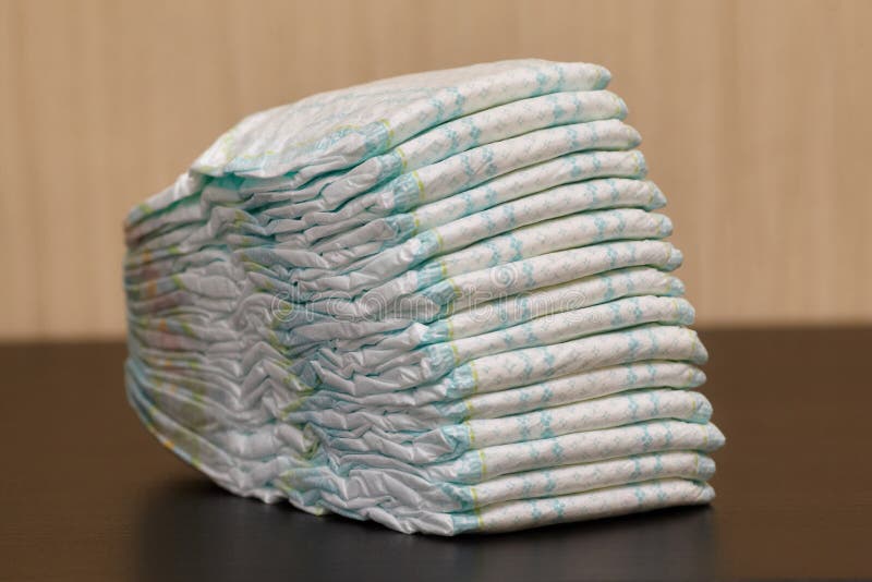Stack of Diapers or Nappies on Table, Copyspace Stock Image - Image of ...