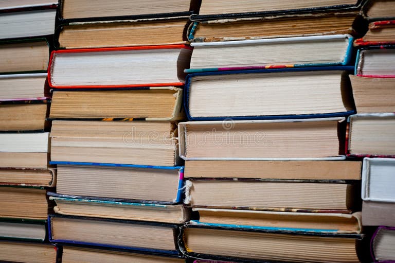 A Stack of Different Books of New and Old Folded Vertically Stock Image ...