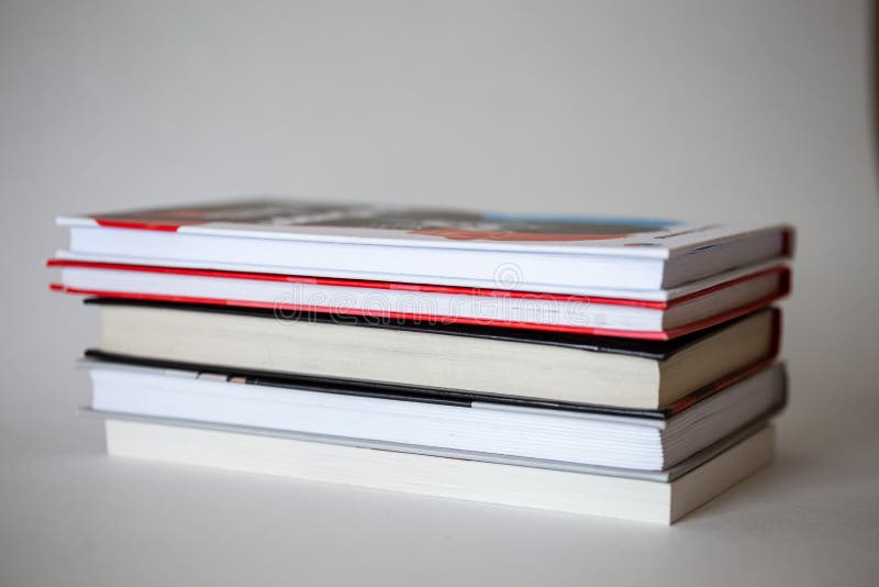 Stack of Different Books with a Side on a White Background. Stock Image ...