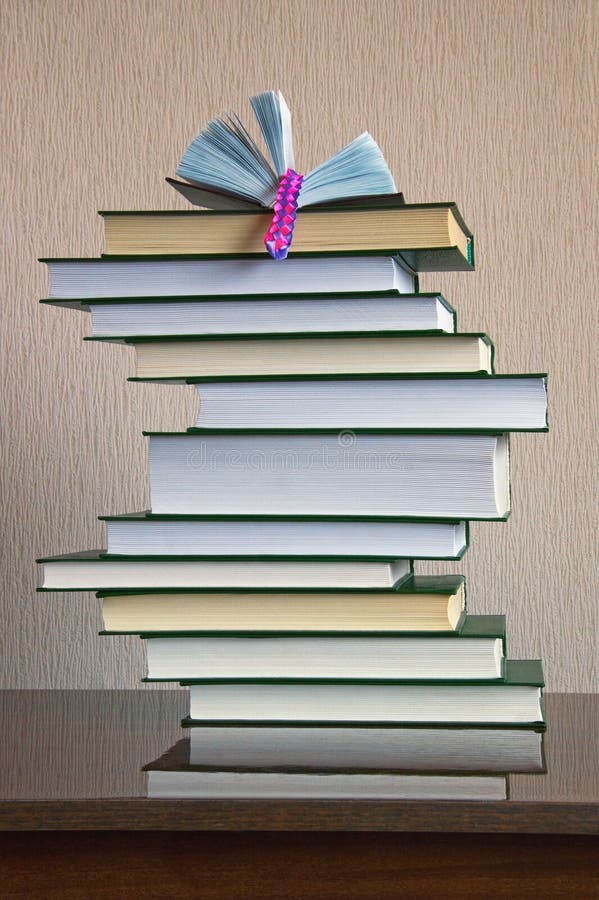 Stack of Different Books on Table Stock Image - Image of horizontal ...