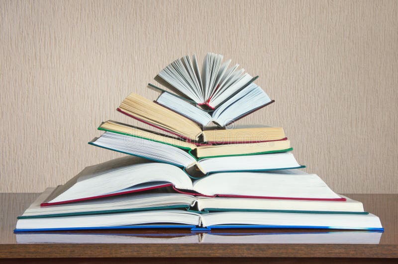 Stack of Different Books on the Table Stock Photo - Image of study ...