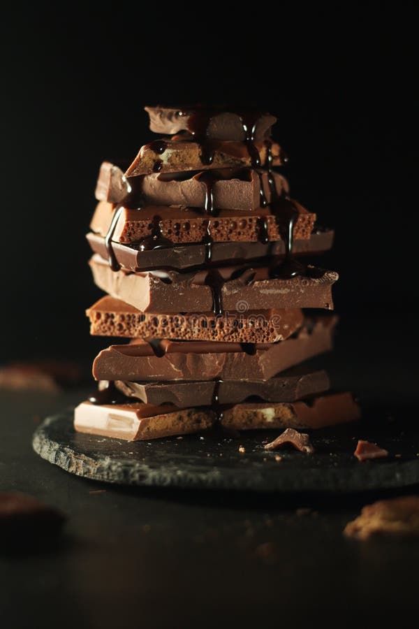 A Stack of Different Chocolate Pieces Stock Image - Image of wooden ...