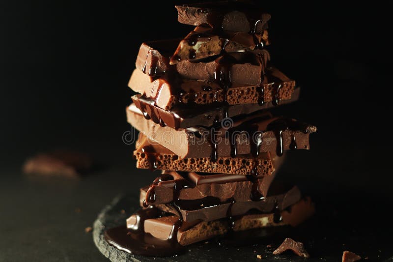 A Stack of Different Chocolate Pieces Stock Image - Image of snack ...
