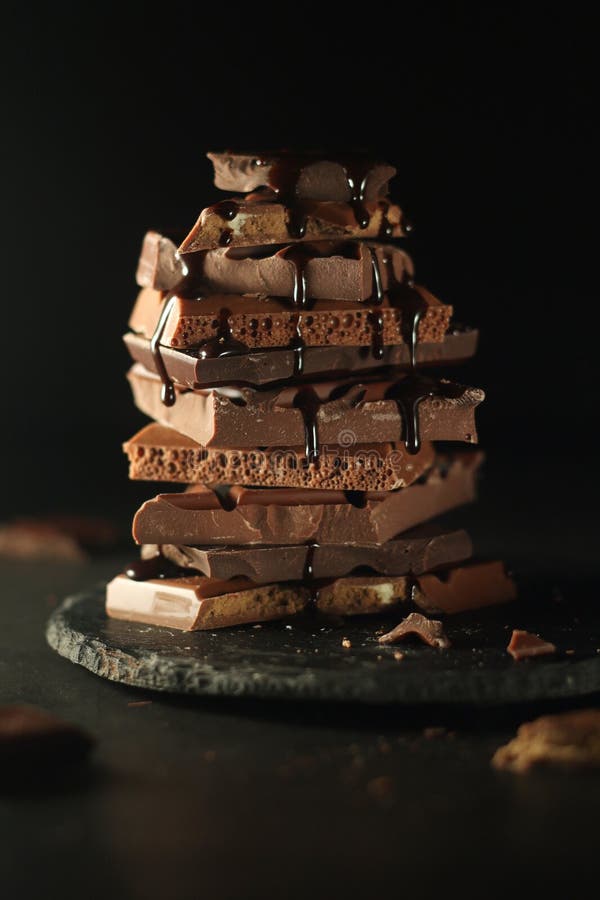 A Stack of Different Chocolate Pieces Stock Photo - Image of calorie ...