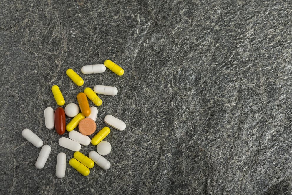 Stack of Different Colorful Pills Stock Photo - Image of help, drug ...