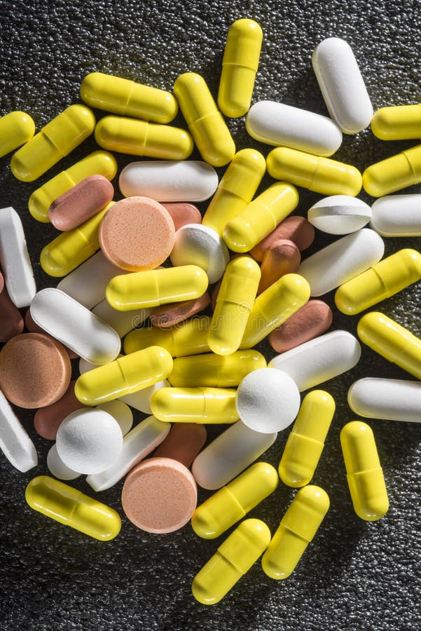 Stack of Different Colorful Pills Stock Photo - Image of health ...