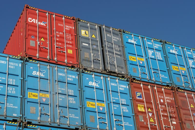 Stack of Different Colors Containers Secured on the Ship with One ...